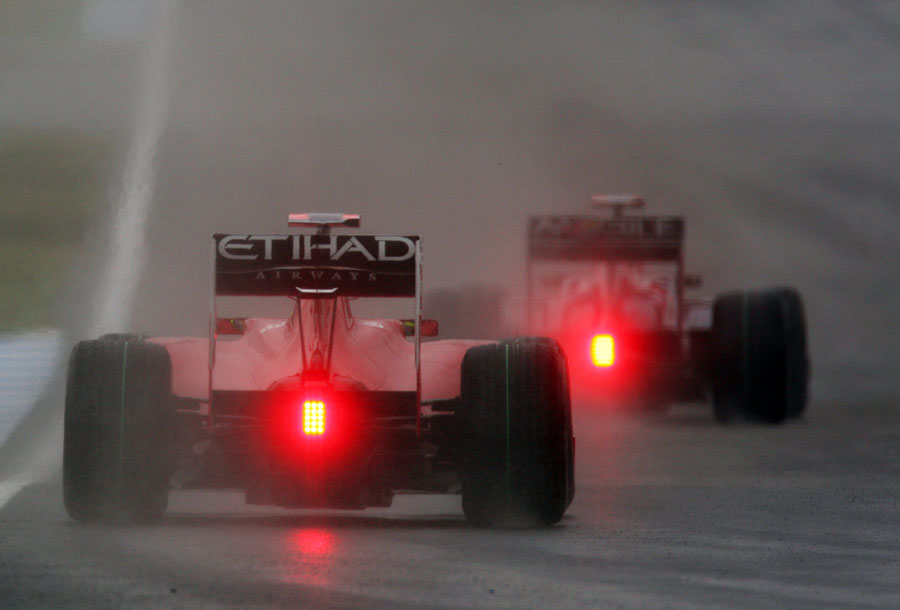 Why does the rain light come on in a dry race? : r/F1Technical